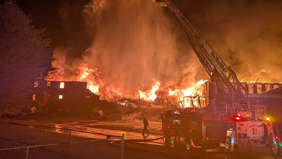 Crews work overnight to contain large fire at textile plant