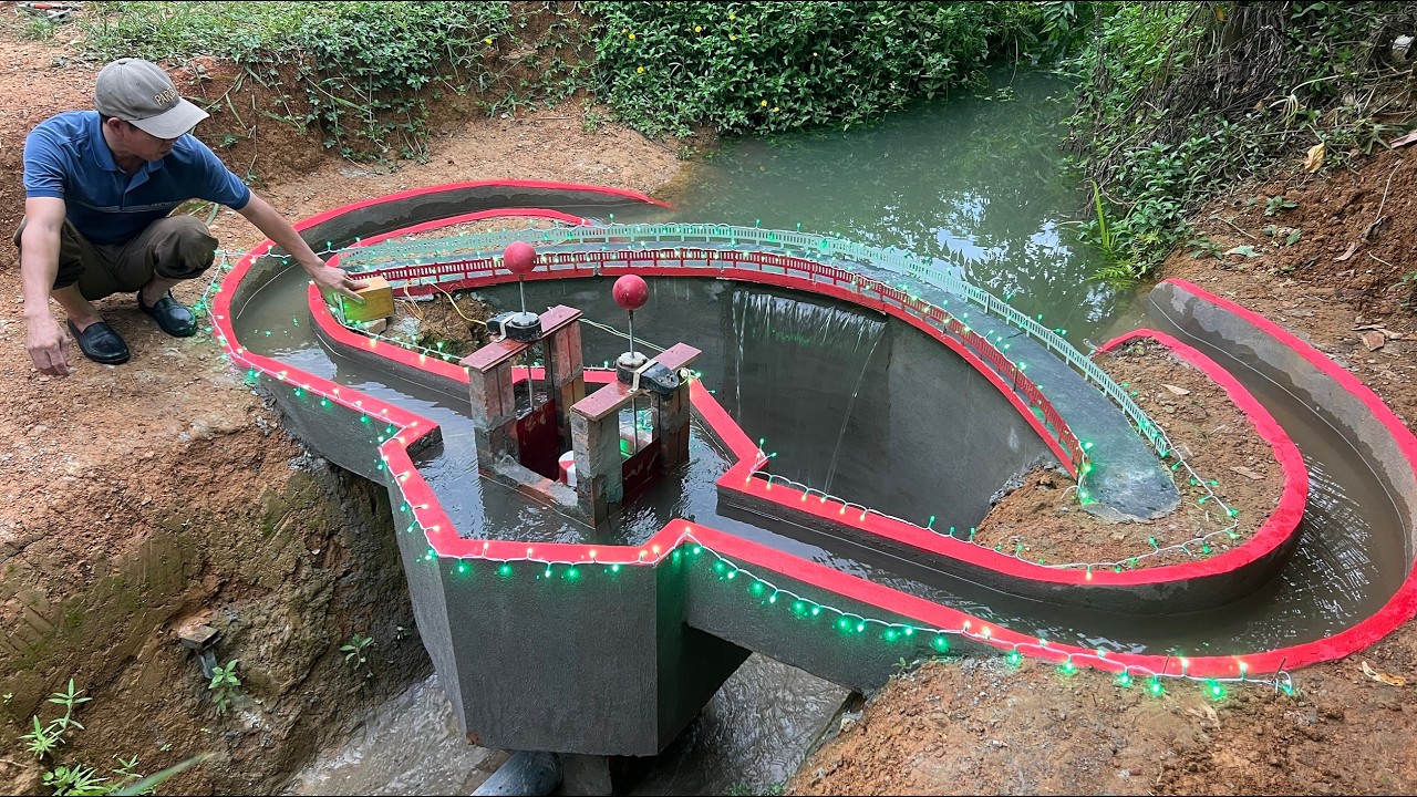 Building a mini curved hydroelectric dam with unique turbines