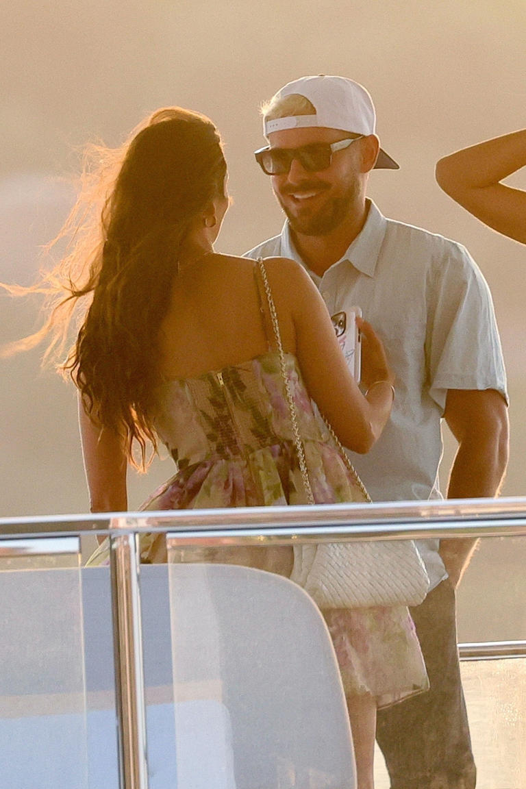 Newly single Nina Dobrev cozies up to Zac Efron in flirty vacation pics