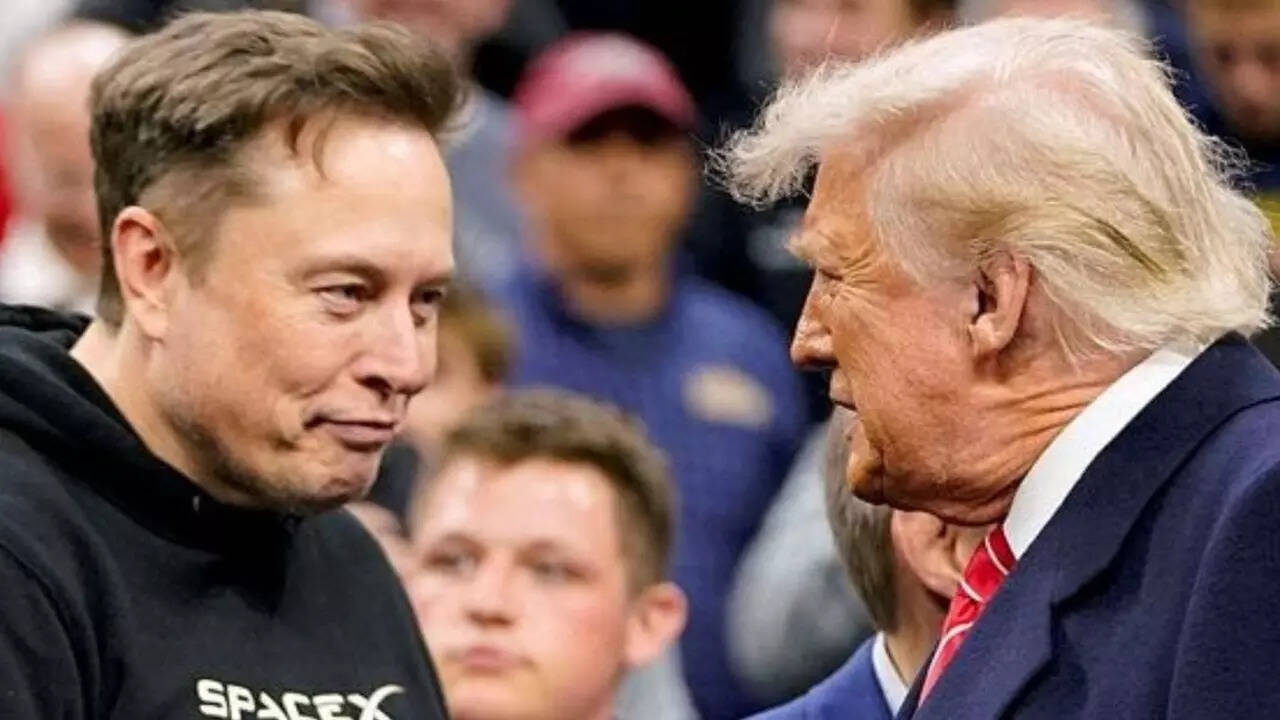 Elon Musk makes ‘pyramid hand symbol’ as he reunites with Donald Trump ...