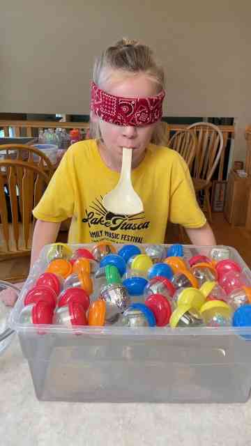 Family spoon mouth challenge game night