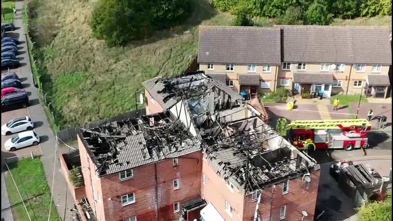 drone footage: Three children taken to hospital after fire tears ...