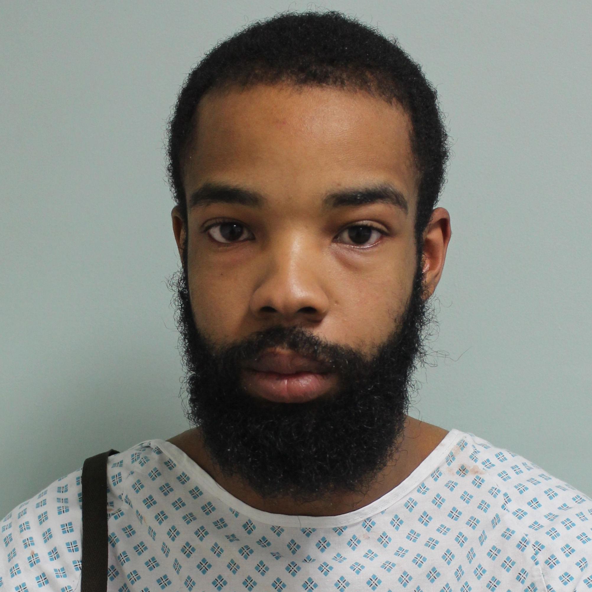 Two jailed for killing man and hiding body in car