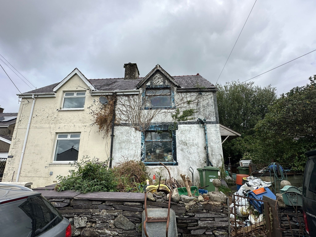Trash-filled house could be yours for $54K
