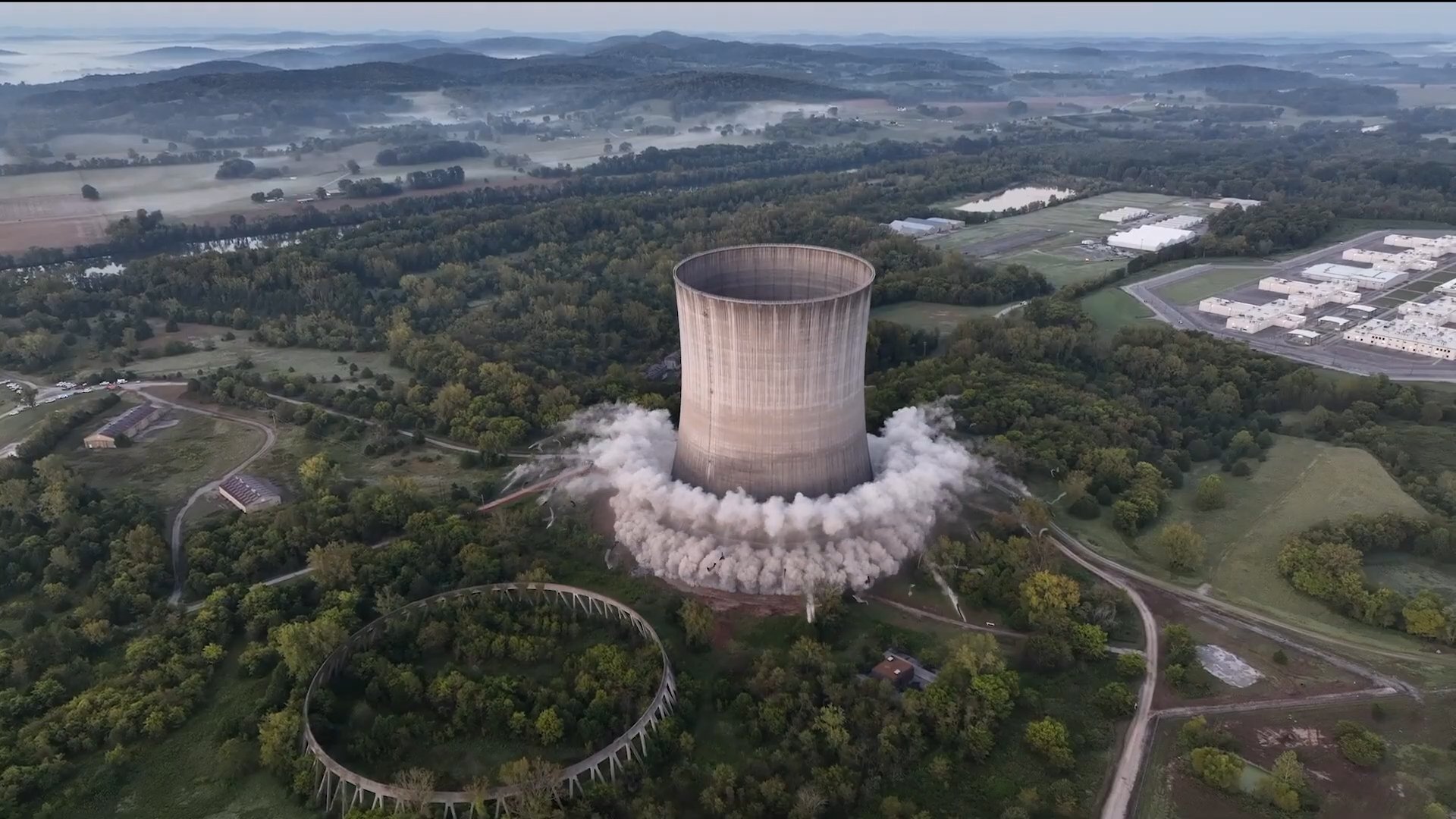 Moment nuclear cooling tower is demolished in controlled implosion