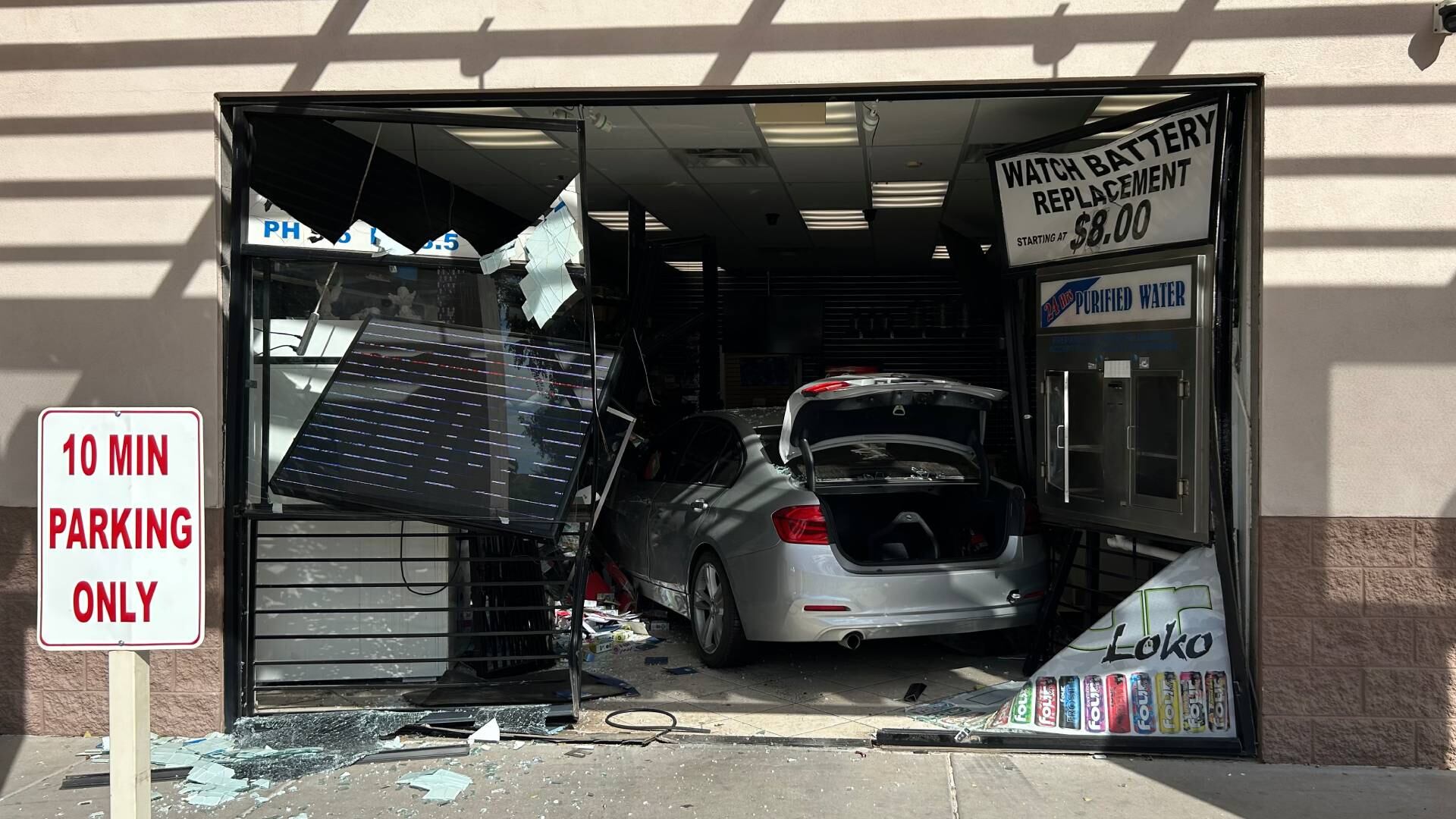 Car crashes through front glass of convenience store in Mesa