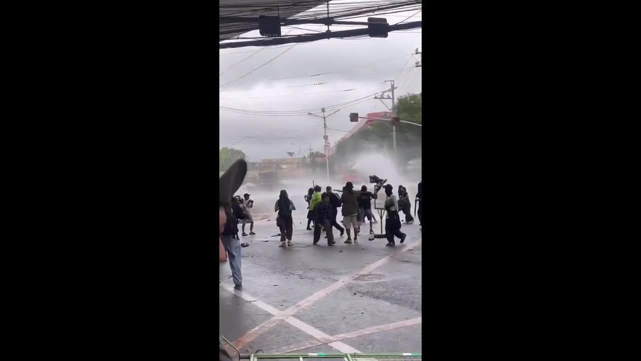 Protesters attack police at anti-corruption rally in the Philippines