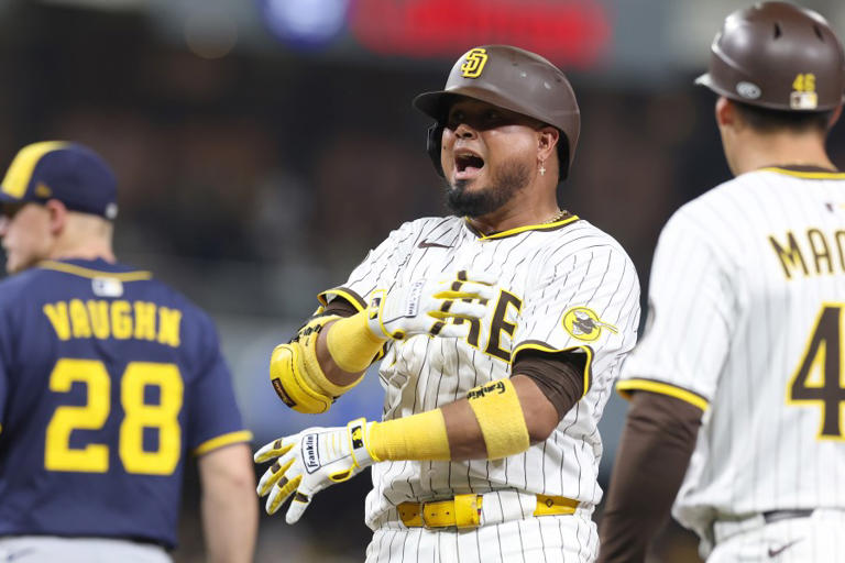 Padres earn spot in playoffs after beating Brewers