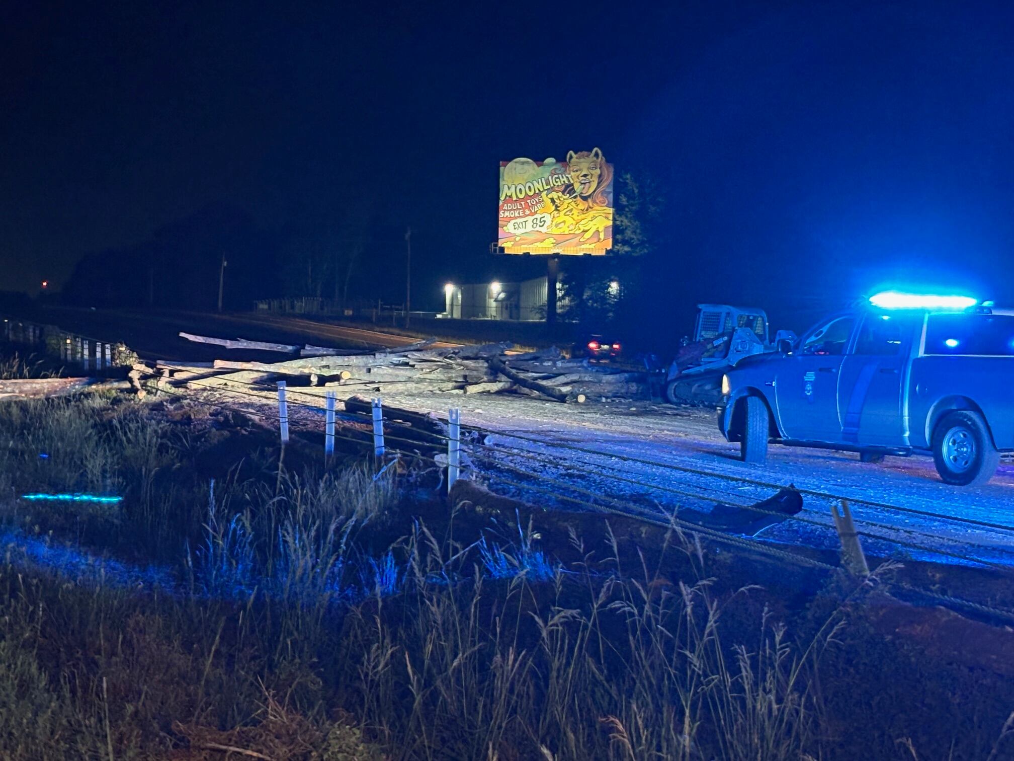 Drivers injured after log truck overturns in crash with SUV on I-55