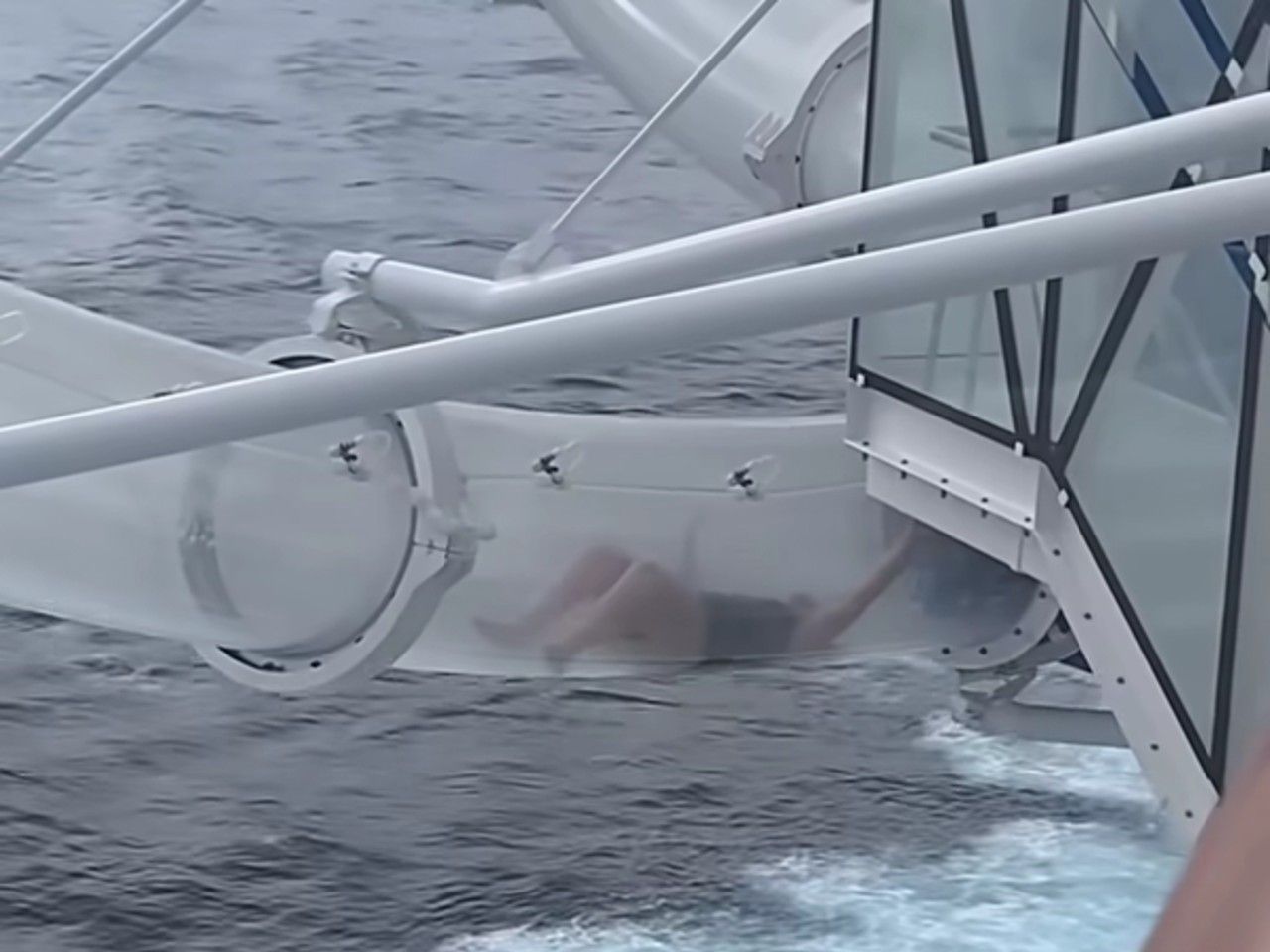 Woman 'literally stuck' inside clear cruise ship water slide over the ocean