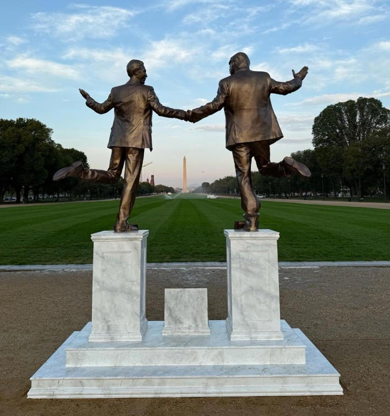 Mysterious new statue of Epstein and Trump holding hands appears in DC