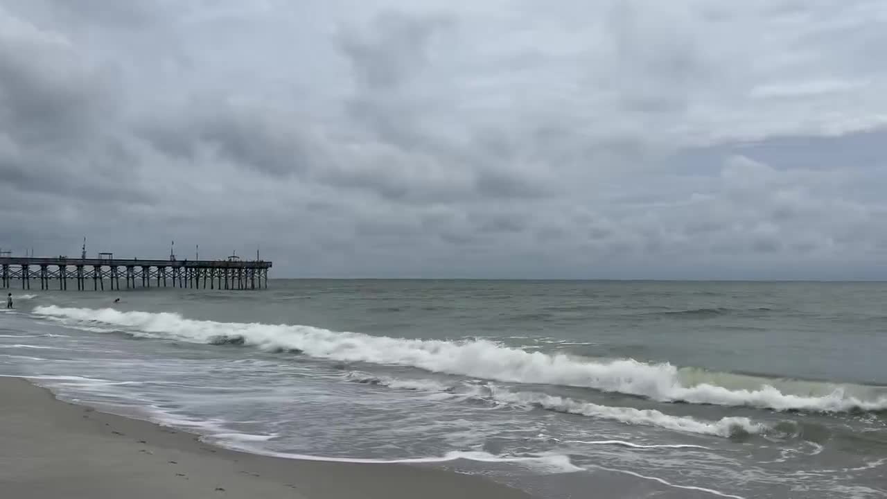 Approaching storm and gentle waves at Myrtle Beach, USA