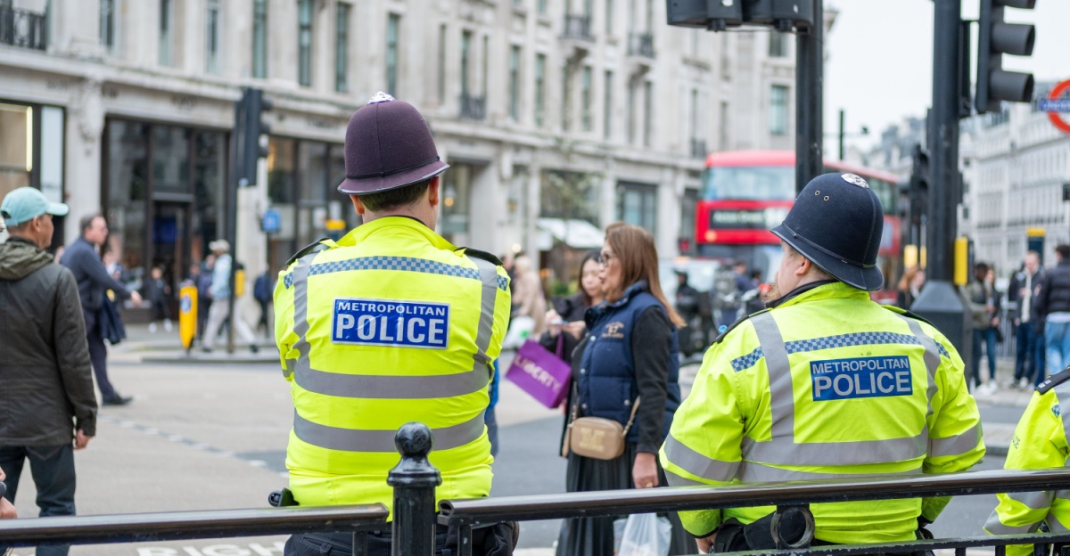 Protester arrested after taking down flag at Iranian embassy in London