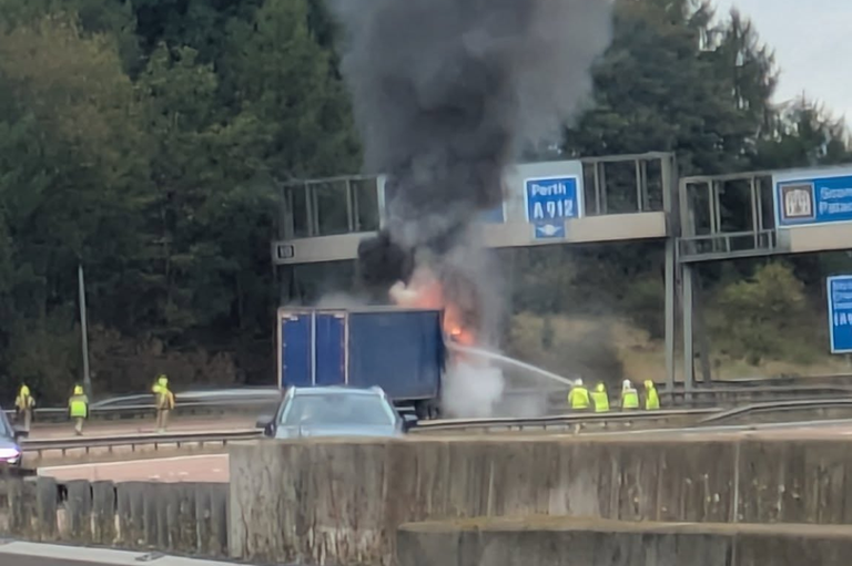 Lorry bursts into flames on M90 as cops close major road