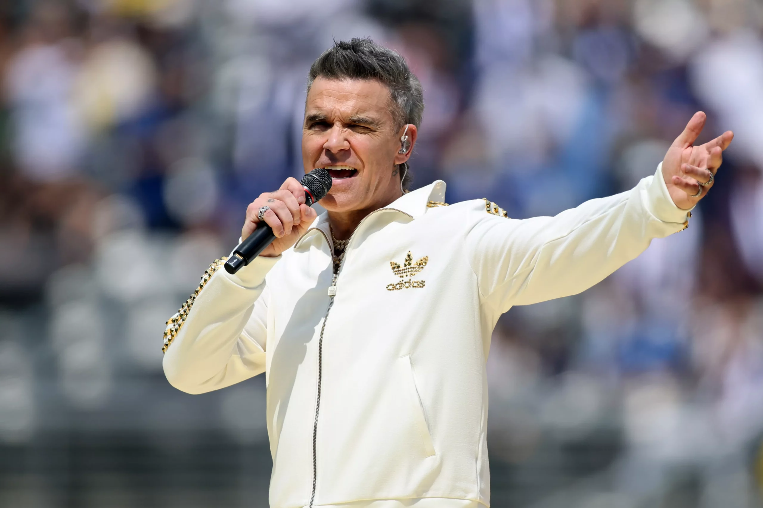 Robbie Williams' Konzerte in Düsseldorf: Tickets, Anfahrt & Infos