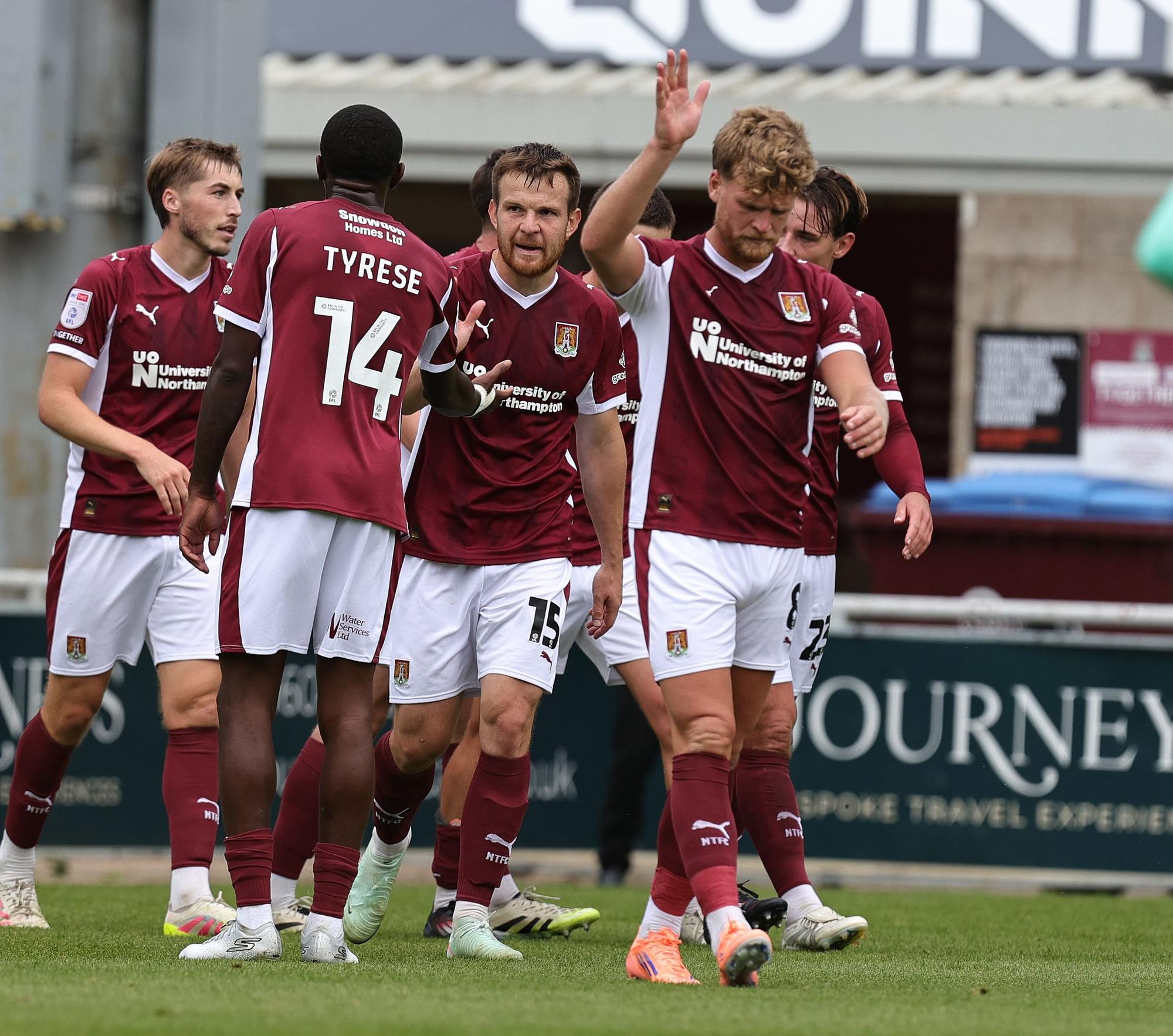 Cobblers players support staff in charity walk across London on Friday