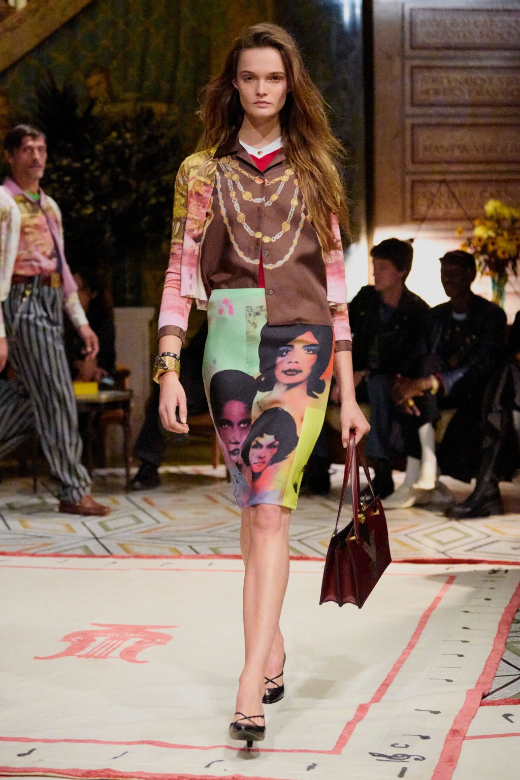 Prada, Versace Deal Completed