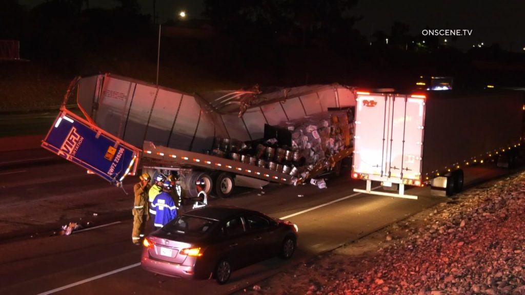 Several Big Rigs Crash, Spill Thousands of Beer on 210 Freeway
