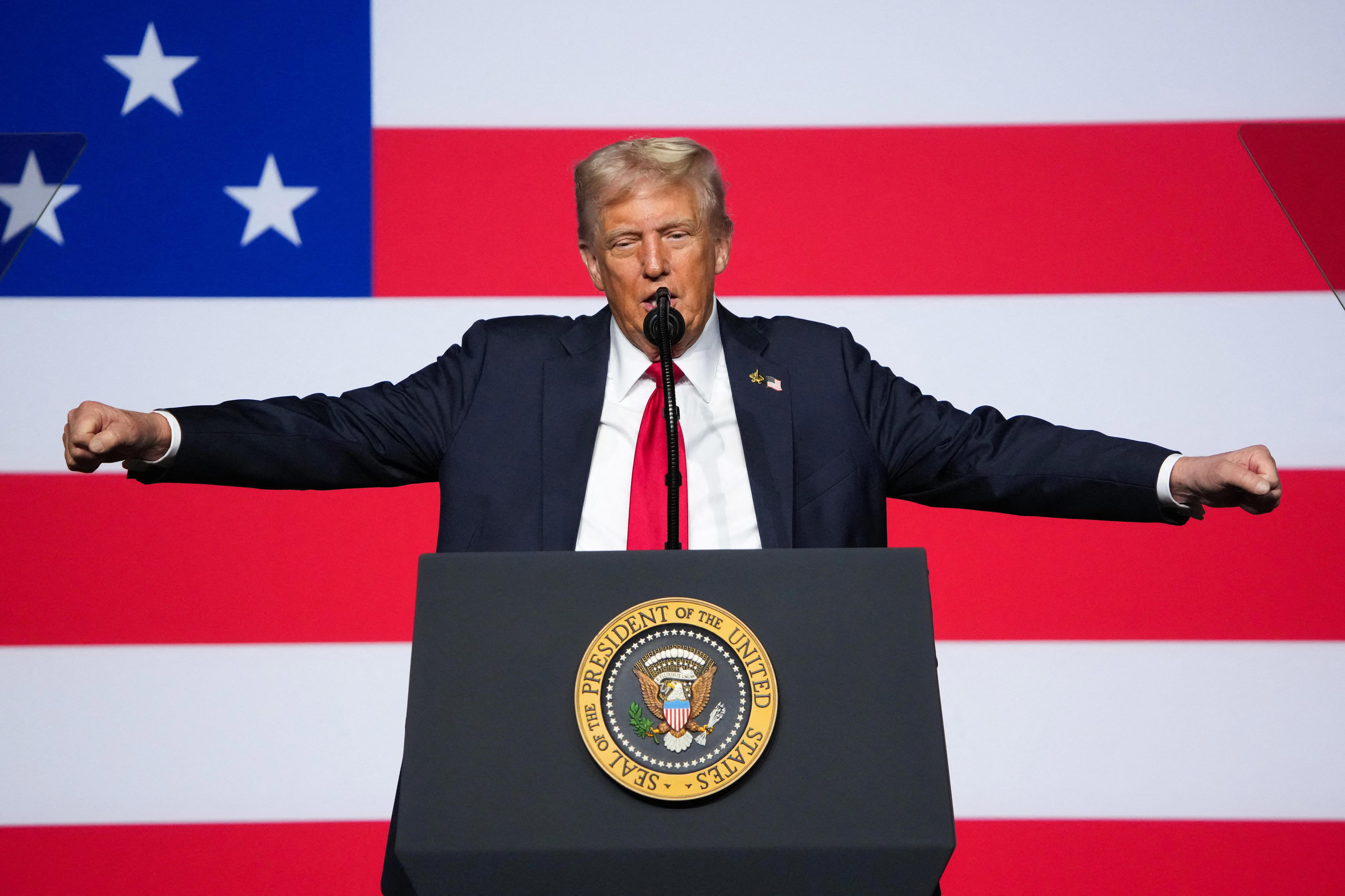 Trump threatens demotions at military summit