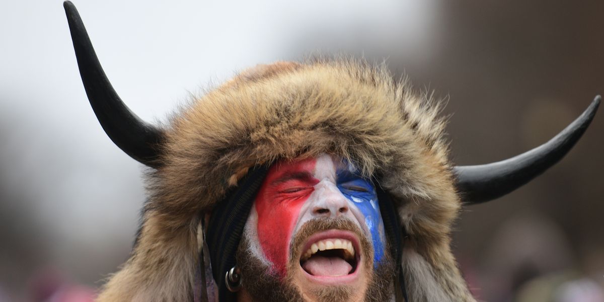 The QAnon Shaman Would Like to Challenge the Validity of Trump’s Presidency