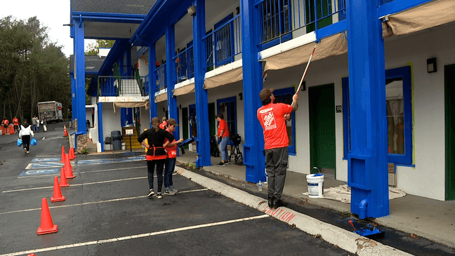 Volunteers work with ABCCM to restore housing for Asheville veterans