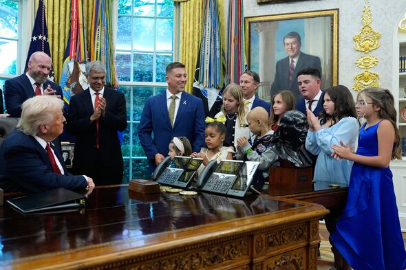 Trump shares rare heartwarming moment with childhood cancer survivors