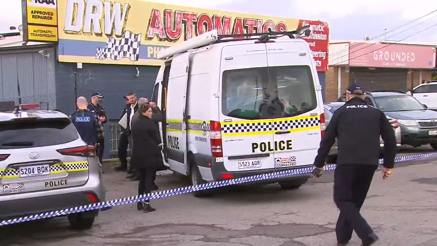 Mystery after man's body found inside Adelaide warehouse
