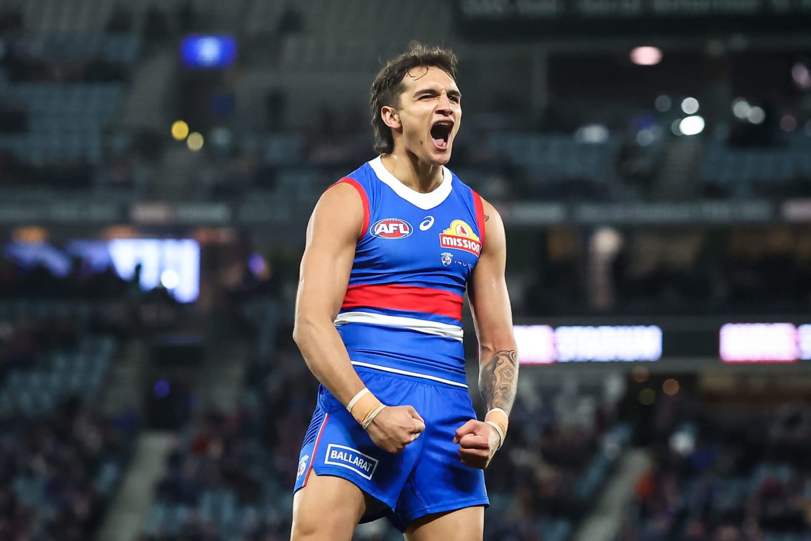 Troubled Bulldogs forward lands in Gold Coast ahead of AFL revival bid