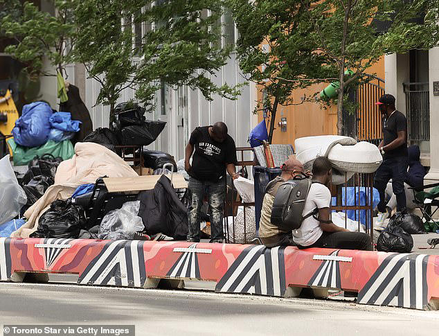 Toronto mayor threatens $107m property tax rise to pay for the cost of ...