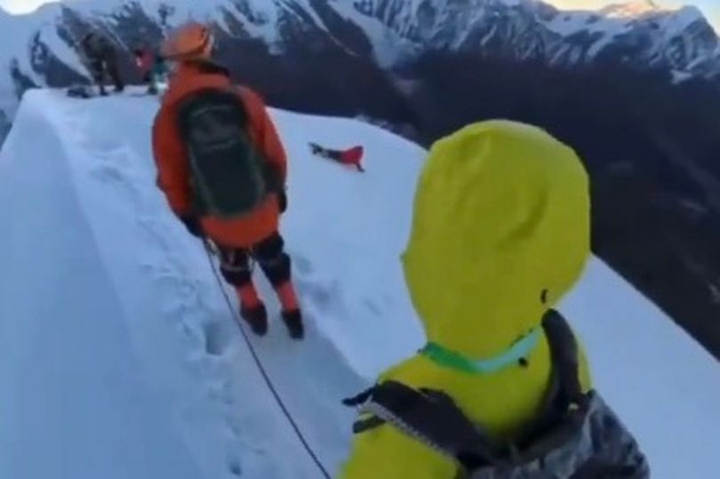 Shocking moment mountaineer dies in 650ft fall while trying to take selfie