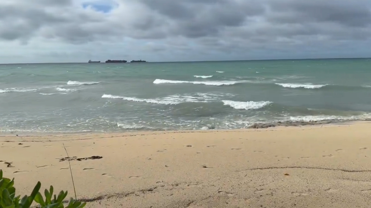 Overcast skies and choppy waves during Tropical Storm Imelda in New ...