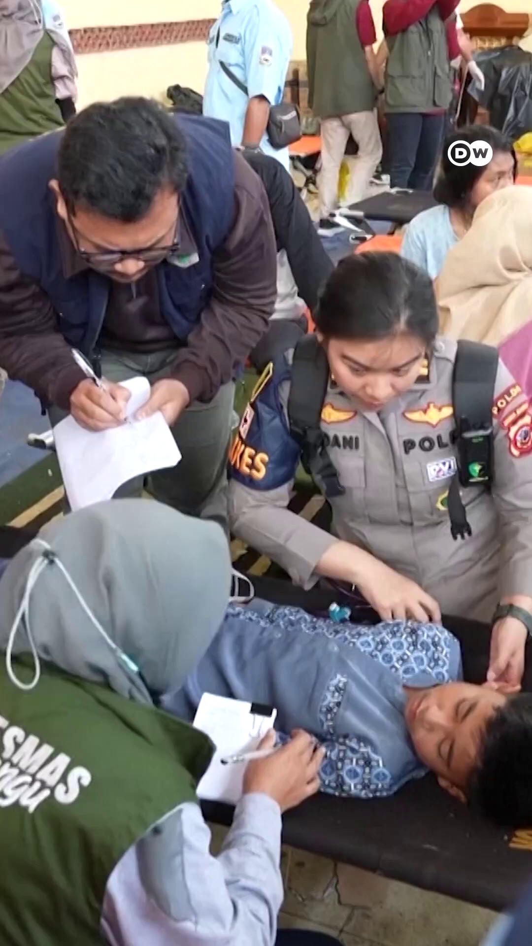 Indonesian children fall ill from free school meals, threatening aid effort