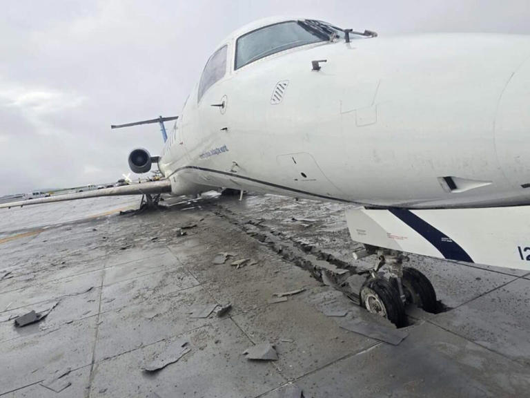 United plane overshoots runway in Virginia during heavy rain