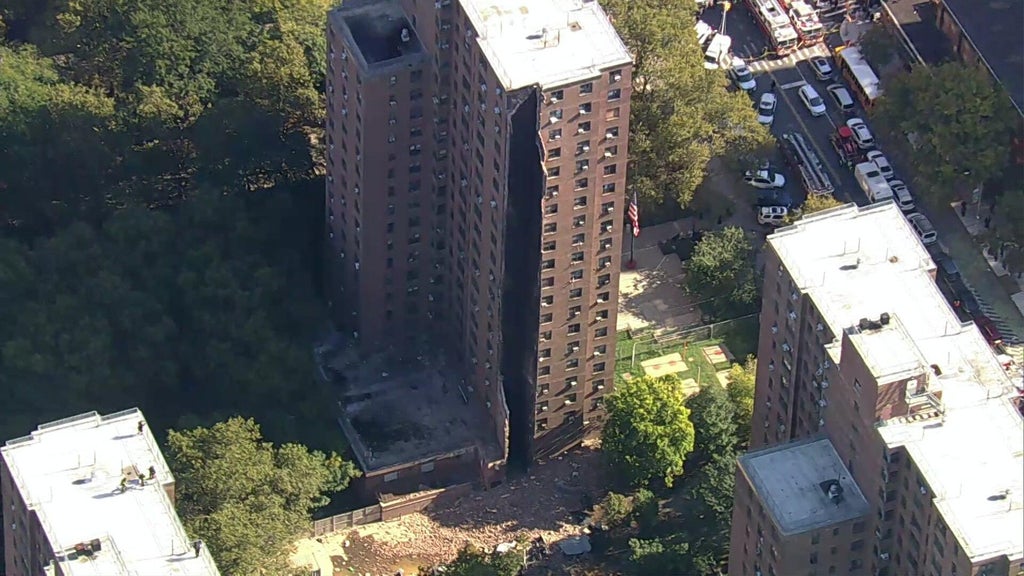 Bronx high-rise partially collapses after boiler room explosion. Video ...