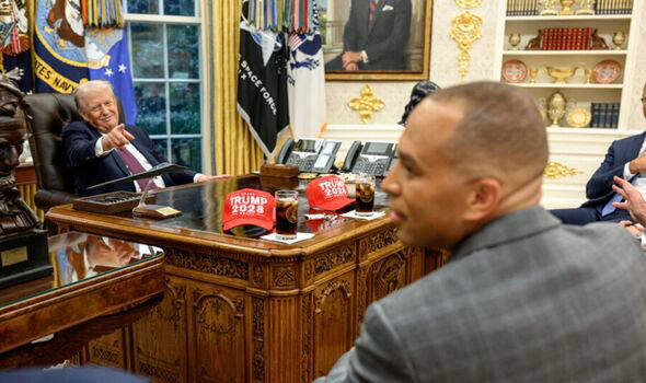 Trump points and laughs at Democrats in leaked photo as government ...