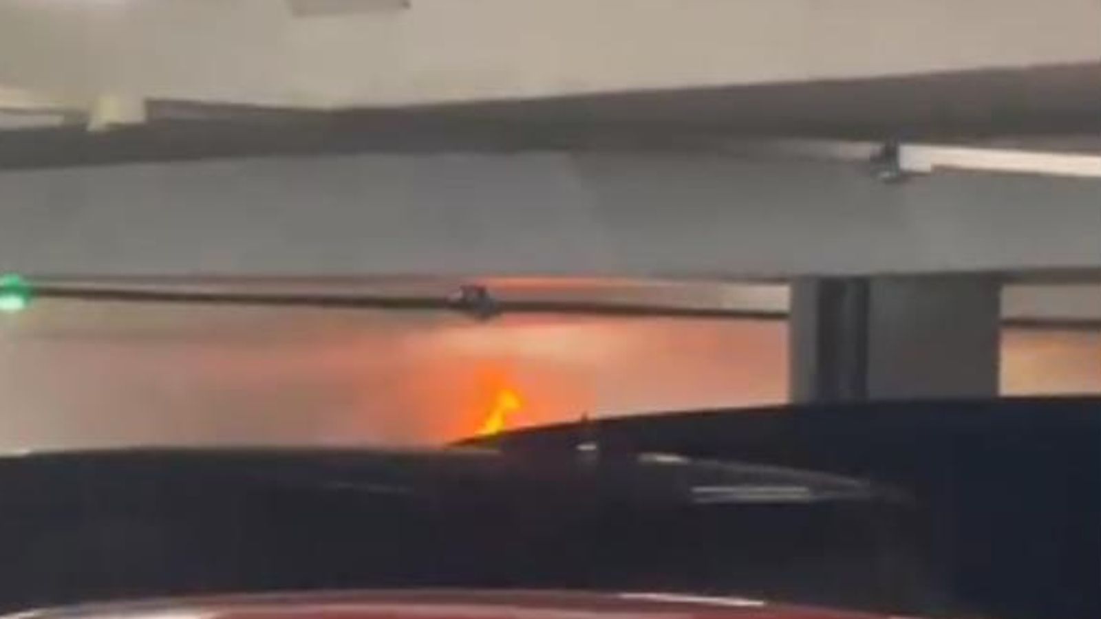 Vehicle destroyed and road closures after airport car park fire
