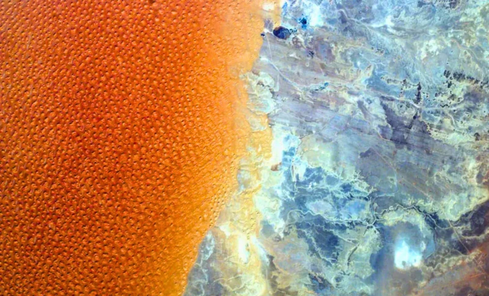 Saharan ‘Star Dunes’ Clash with Alien Terrain in Stunning Satellite View