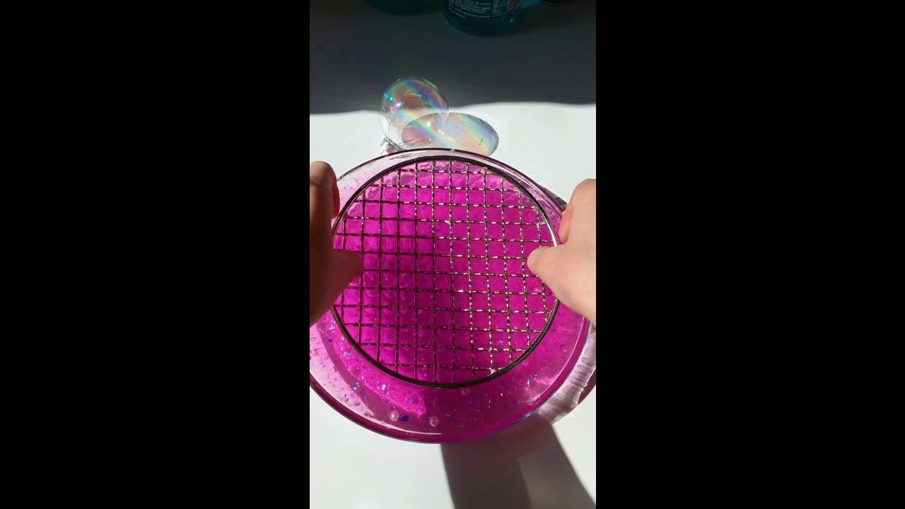 Satisfyingly Playing Pink Glossy Slime