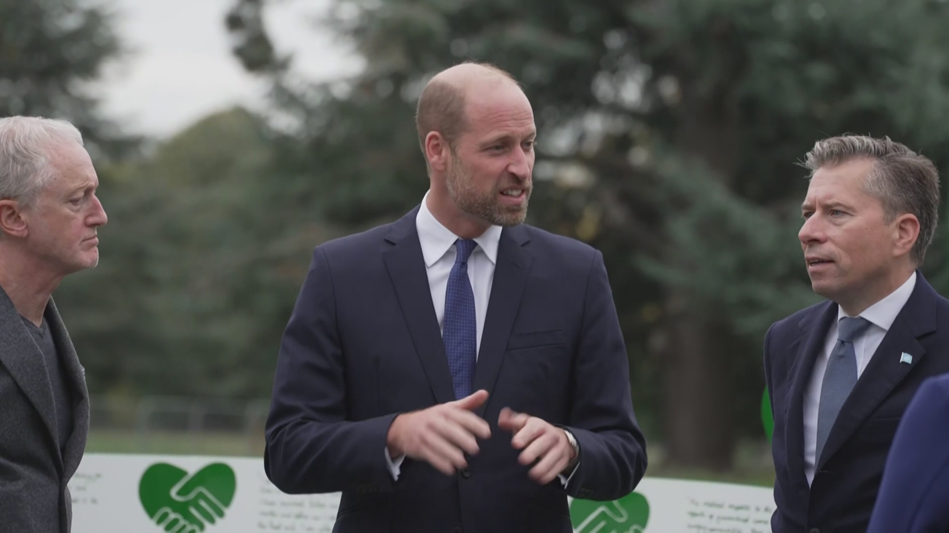 Prince of Wales views new memorial to humanitarian workers