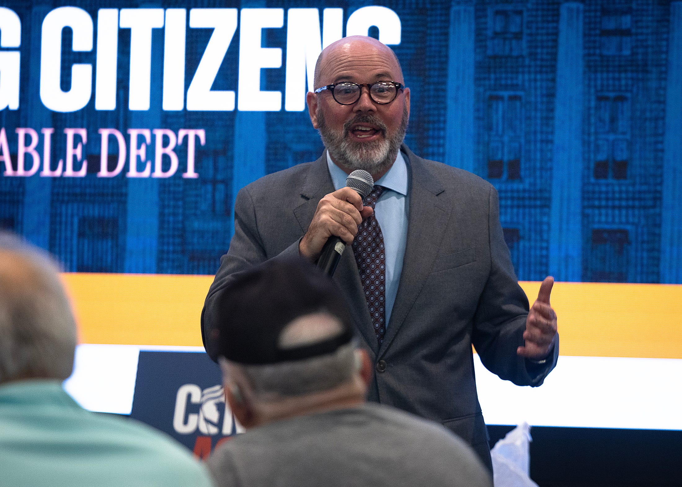 Bay County residents tackle $37T debt in national budget workshop at ...