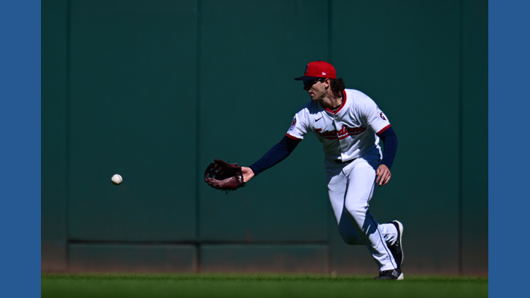 Cleveland Guardians' Chase DeLauter drops fly ball in center on first ...