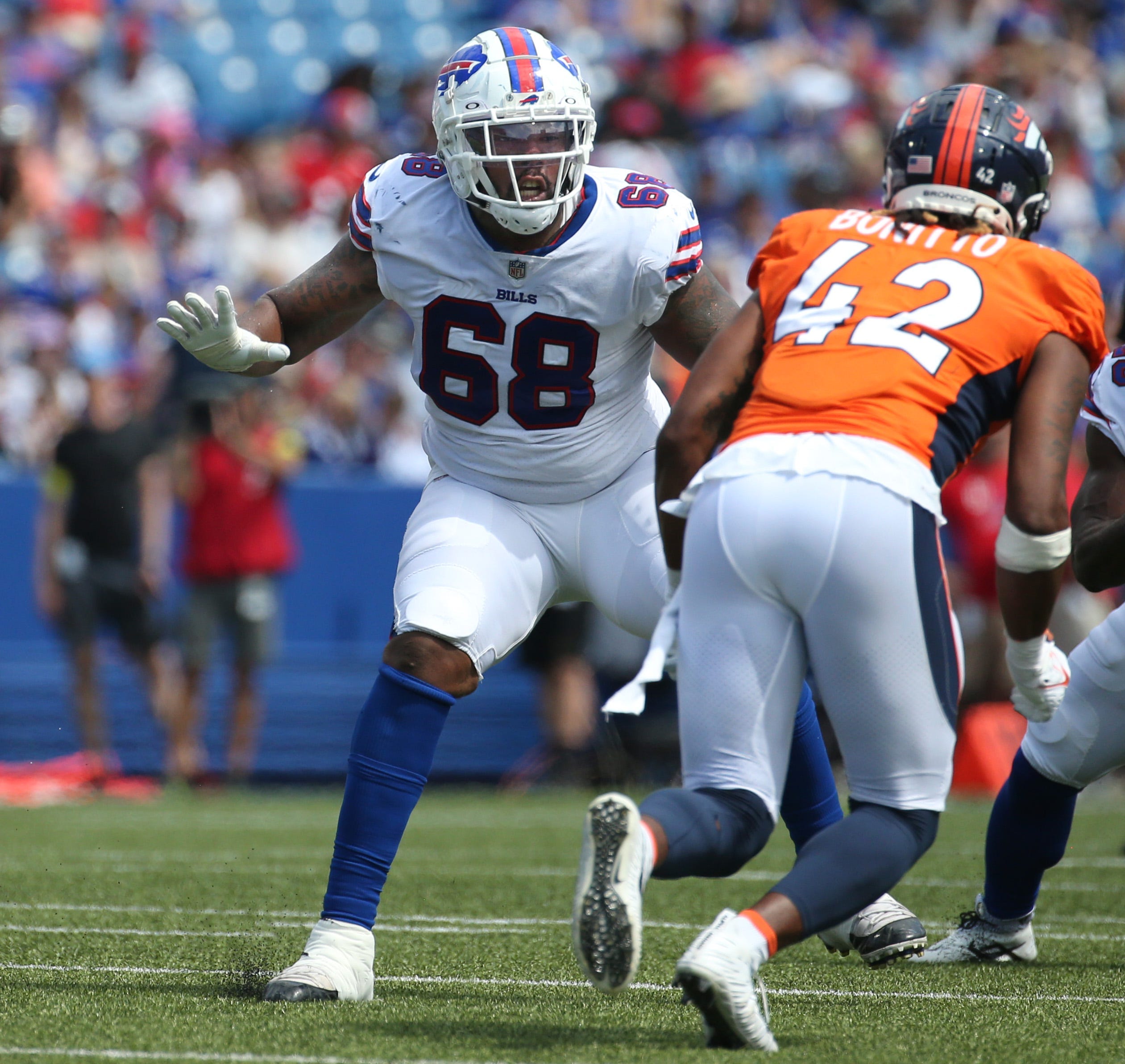 Chargers promote Foster Sarell, sign Bobby Hart to add offensive line depth