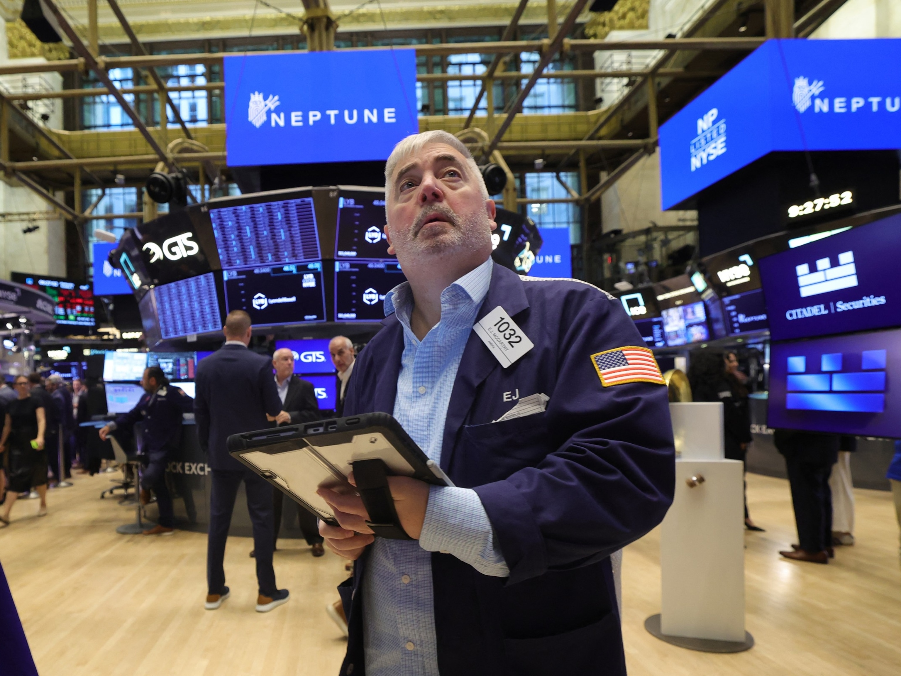 Stocks close higher on 1st day of government shutdown