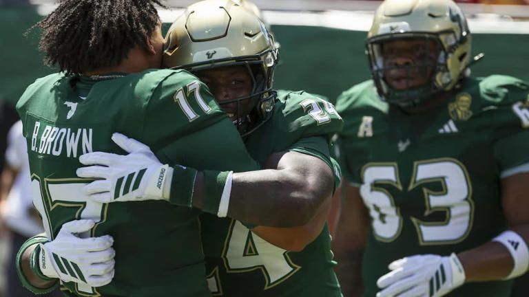 USF linebacker Mac Harris lighting it up, and lighting the way