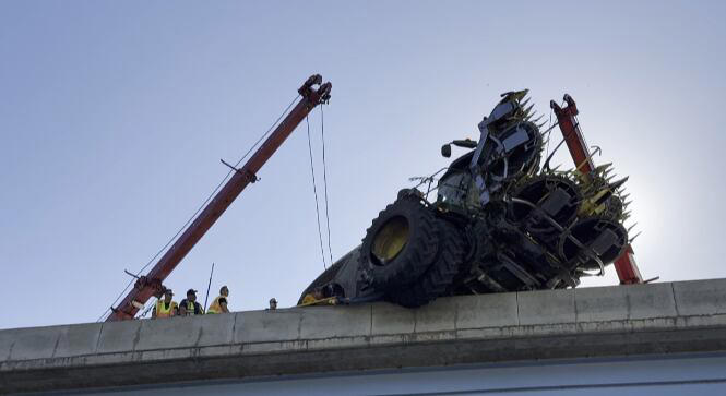 Grant Marsh Bridge crash leads to farm machinery hanging off bridge
