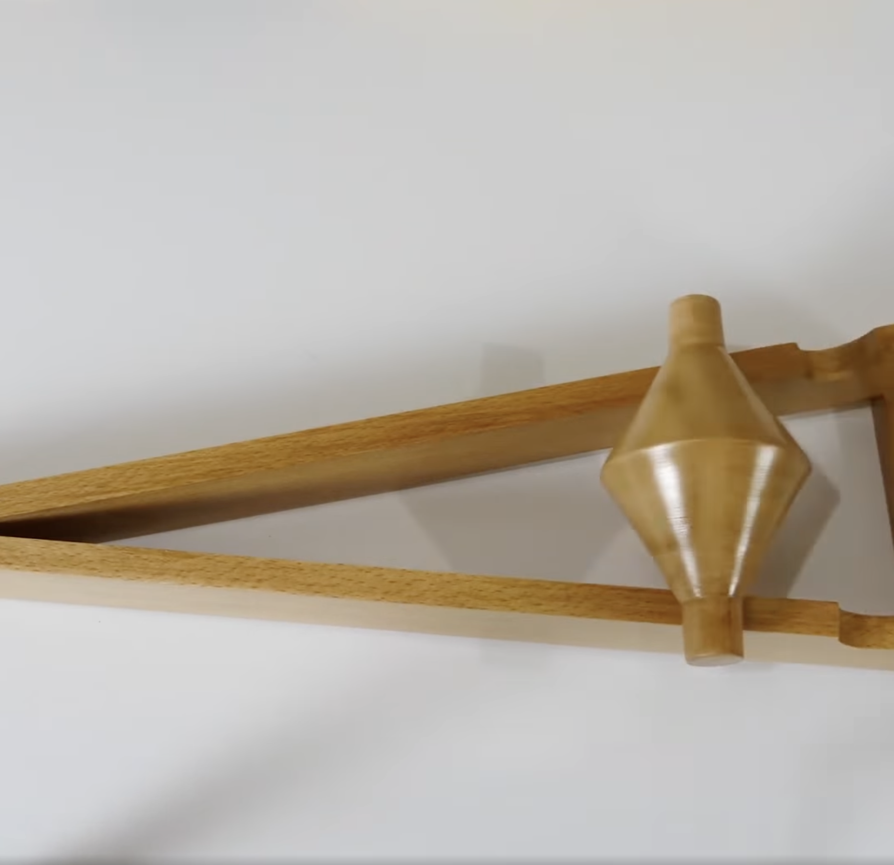 A shape that rolls uphill