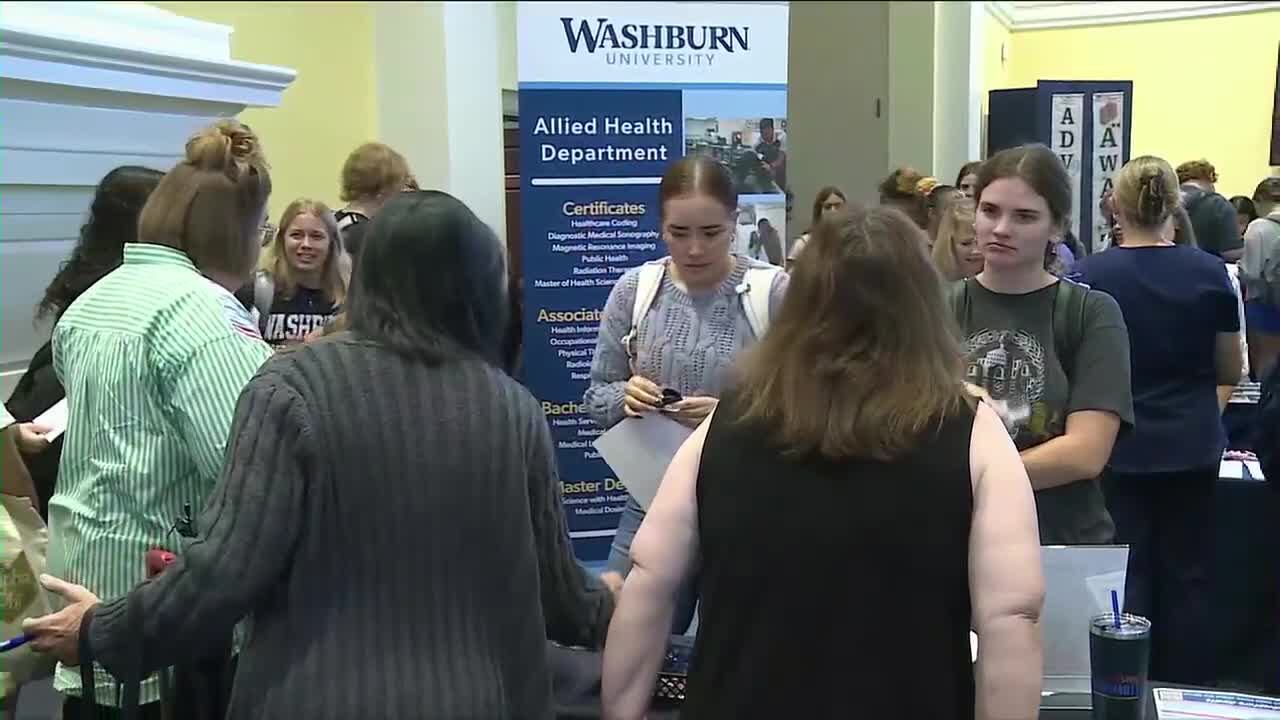 Students explore possibilities, the skills they can learn at Washburn University fair