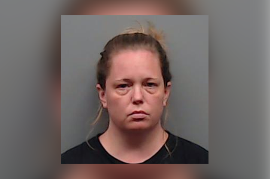 Officials ID woman arrested for running over teen trapped under vehicle ...