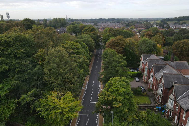 Controversial cycle lane along busy Greater Manchester route takes step ...