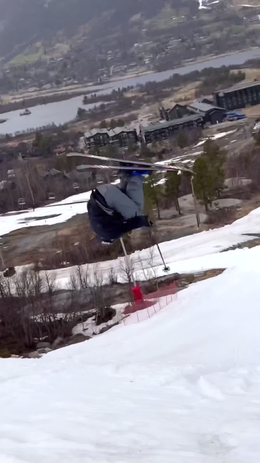 Freestyle Skiing Tricks and Jumps on a Snowy Mountain Slope